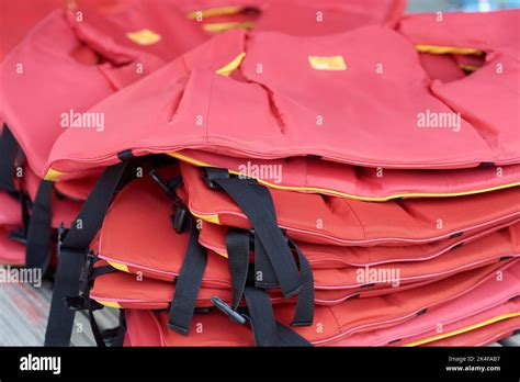 A Stack Of Red Life Jackets Stock Photo Alamy