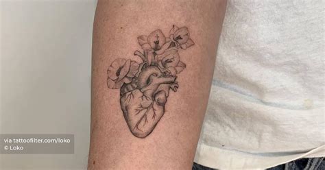Anatomical Heart With Flowers Tattoo On The Inner