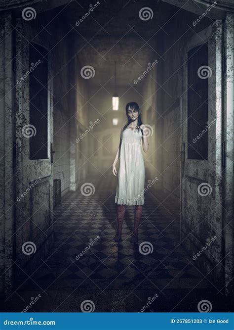 Ghost Girl Standing In Corridor Of Haunted Hospital Or Asylum Wearing