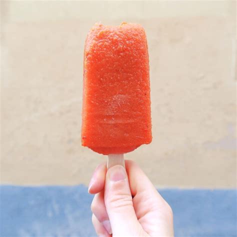 Premium Photo Cropped Hand Holding Ice Cream Outdoors