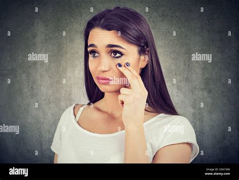 Woman Pulling Down Eyelid Checking Her Eye Looking In Morrow Feels