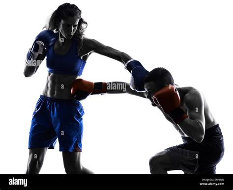 One Woman Boxer Boxing One Man Kickboxing In Silhouette Isolated On