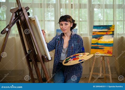 Female Painter Painting On Canvas In Her Workshop Stock Image Image