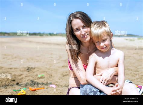 Portrait Of Mother And Son On Beach Stock Photo Alamy