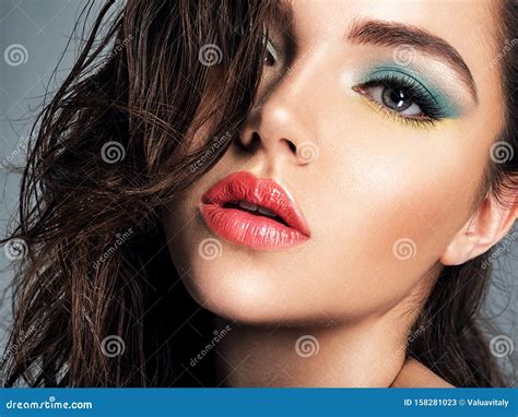 Beautiful Brunette Woman With Bright Red Lipstick On Her Lips Gorgeous Girl With Blue Eye