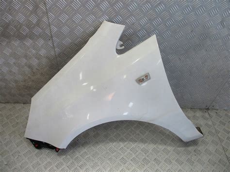 BŁOTNIK LEWY OPEL CORSA D Z474 13425882782 oficjalne archiwum Allegro