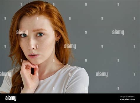 Portrait Of A Woman With Her Hand On Her Chin Hi Res Stock Photography