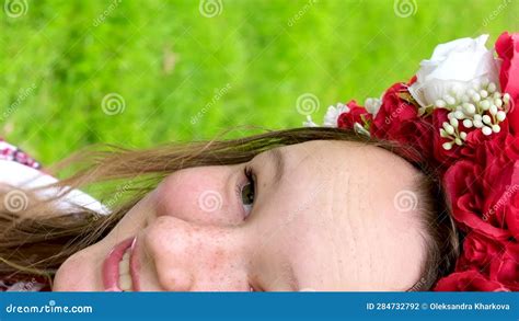 Beautiful Ukrainian Young Woman Tender Girl In A Large Red Wreath Of Bright Pink White Red