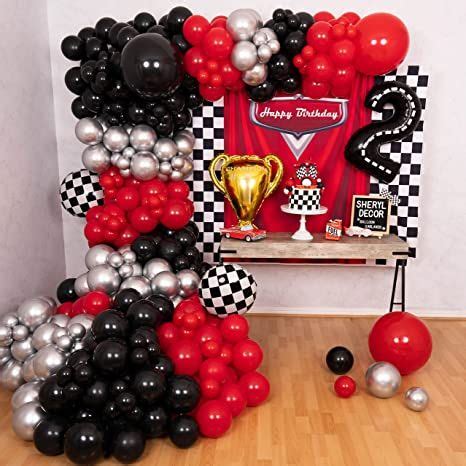 The Balloon Arch Is Decorated With Black Silver And Red Balloons