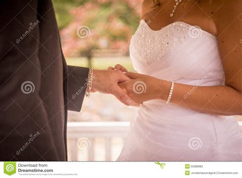 Bride Giving Groom His Ring Stock Image Image Of Fence Newly 55389983