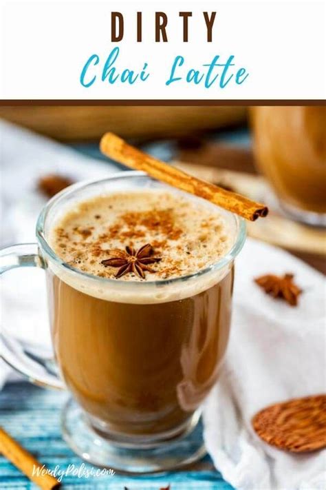 A Cup Of Chai Latte With Cinnamon On The Side