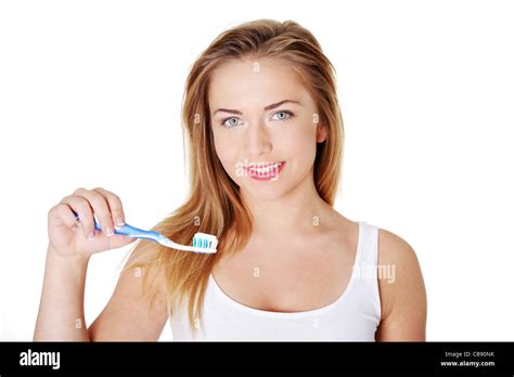 Beautiful Blond Teen Woman Brushing Her Teeth Stock Photo Alamy