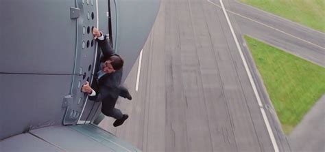 Tom Cruise Hangs Off A Plane In Crazy Mission Impossible Stunt