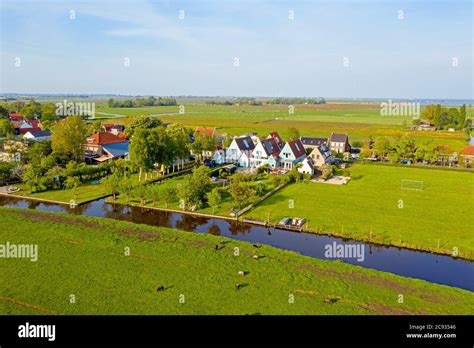 Aerial From A Typical Dutch Landscape In The Netherlands On A Beautiful
