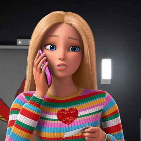 A Barbie Doll Holding A Cell Phone To Her Ear And Looking At The Camera