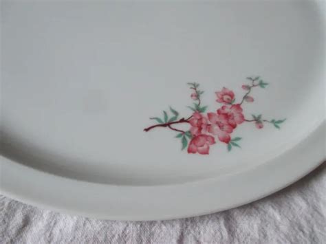 PLAT ASSIETTE DE présentation en porcelaine de Limoges motif floral