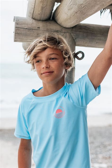 Icon S S Rash Top Curated Shopping Blue Feather Boy Hairstyles