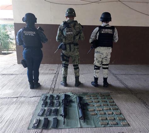 SSP Sedena y GN aseguran armamento y equipo táctico en Tepalcatepec