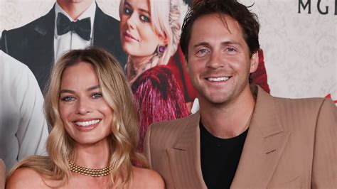 Margot Robbie And Husband Tom Ackerley Make A Stylish Pair During A