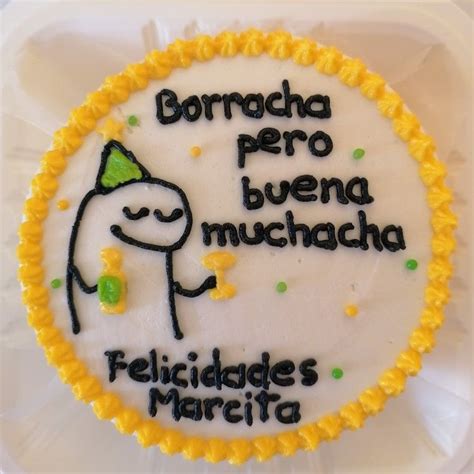 A Birthday Cake That Is Decorated With The Words Borracha Pero Buena
