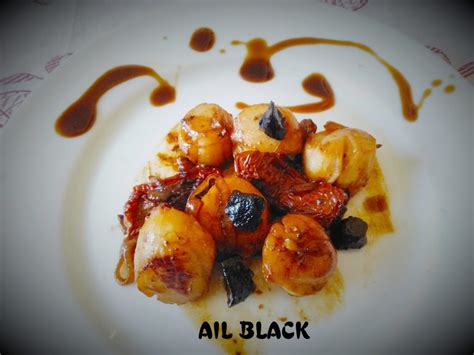 Noix de coquilles Saint Jacques à lail noir AIL NOIR