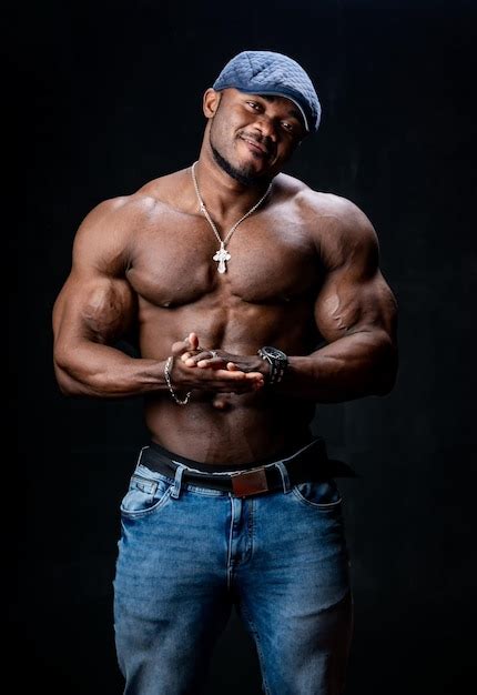 Premium Photo Very Muscular Afro American Man With Naked Torso Poses