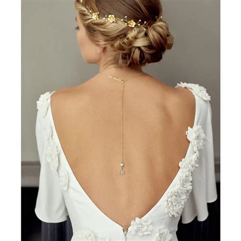 10 magnifiques bijoux de dos à porter avec des robes de mariées dos nu