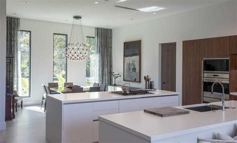 An L Shaped Kitchen Island Is A Creative Way To Include Seating And A
