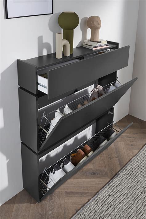 The Shoe Rack Is Built Into The Wall