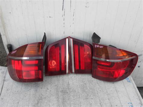 BMW X5 E70 lift lampa tył prawa lewa w klape w błotnik komplet z wtycz