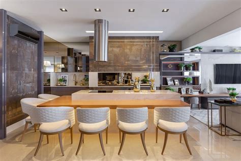 Espaço gourmet contemporâneo ilha de cocção e refeição aço corten