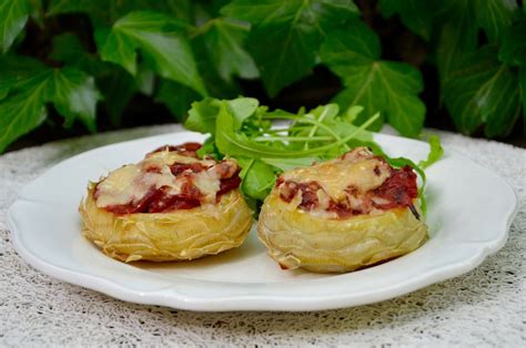 Des coeurs d artichauts garnis de tomates et de parmesan légerement