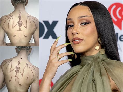 What Does Doja Cat S New Bat Tattoo Really Mean Internet Calls It