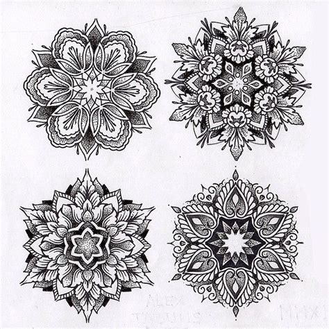 Four Black And White Drawings Of Flowers