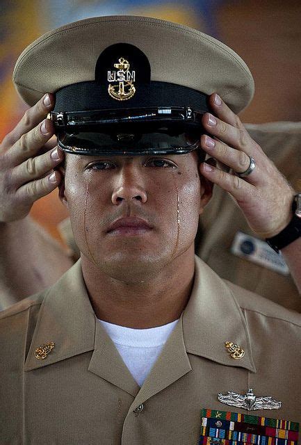 A New Chief Petty Officer Shows His Emotion As His Combination Cover Is
