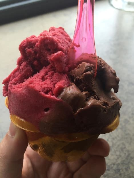 Premium Photo Cropped Hand Holding Ice Cream
