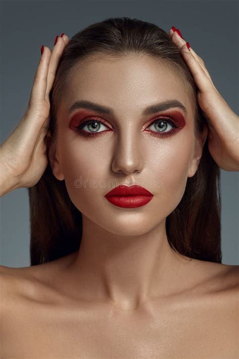 Close Up Glamour Portrait Of A Beautiful Half Naked Model With Bright