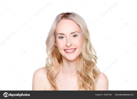 Woman With Braces Smiling Cheerfully Stock Photo Andrewlozovyi