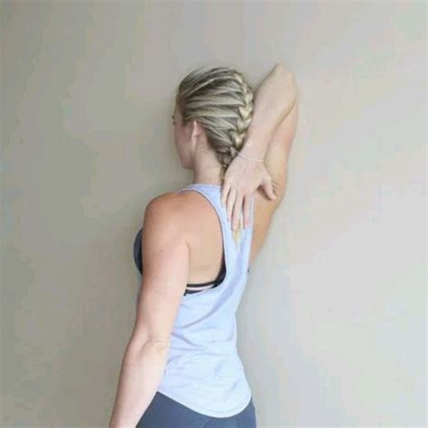 Wall Overhead Triceps Stretch Exercise How To Workout Trainer By