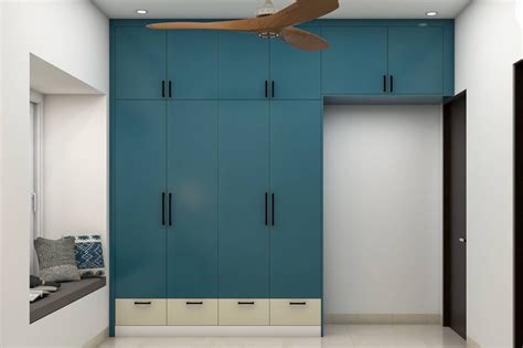 Swing Wardrobe Design With Lofts And Drawer Storage Livspace