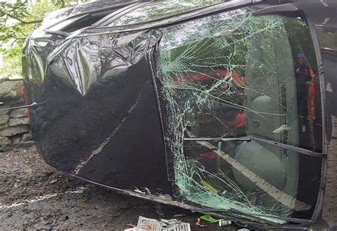 PICTURES Driver S Lucky Escape After His Car Hits A Wall And