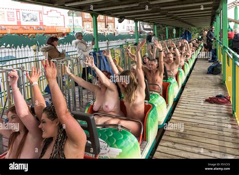 Naked Thrill Seekers Ride The Green Scream Roller Coaster On A Very