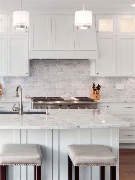 Transitional White Kitchen Design With Dark Wood Flooring