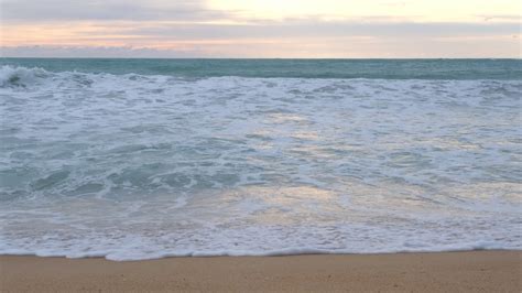 Beautiful Sea Waves And White Sand Beach In The Tropical Island