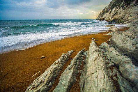 Free Images Beach Sea Coast Sand Rock Ocean Shore Cliff Cove