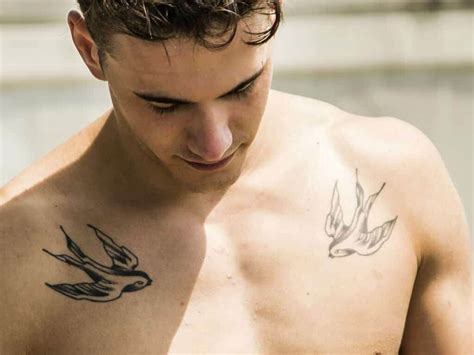 Black Bird Tattoos On Chest