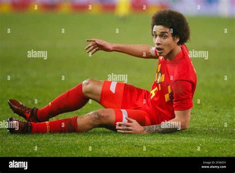 Belgian Axel Witsel Lays On The Ground During The Friendly Game