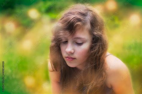 Shy Teenage Girl Alone Outside In Nature Stock Photo Adobe Stock