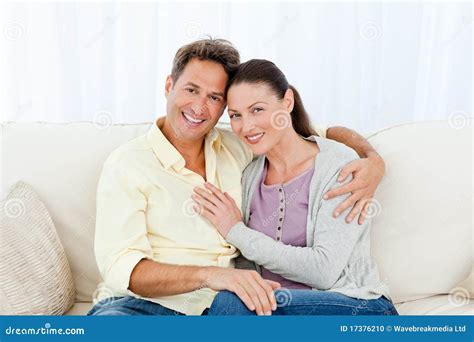 Portrait Of A Lovely Couple On The Sofa Stock Photo Image Of