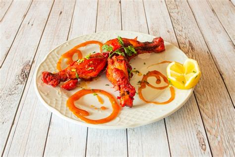 Receta de muslos de pollo asado con receta hindú tandoori con perejil y